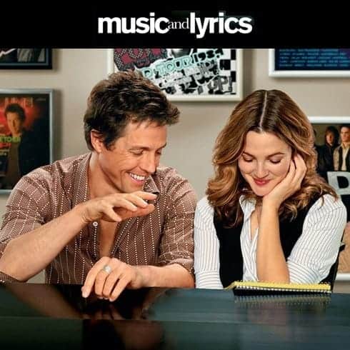 Hugh Grant and Drew Barrymore at Faust Harrison Pianos